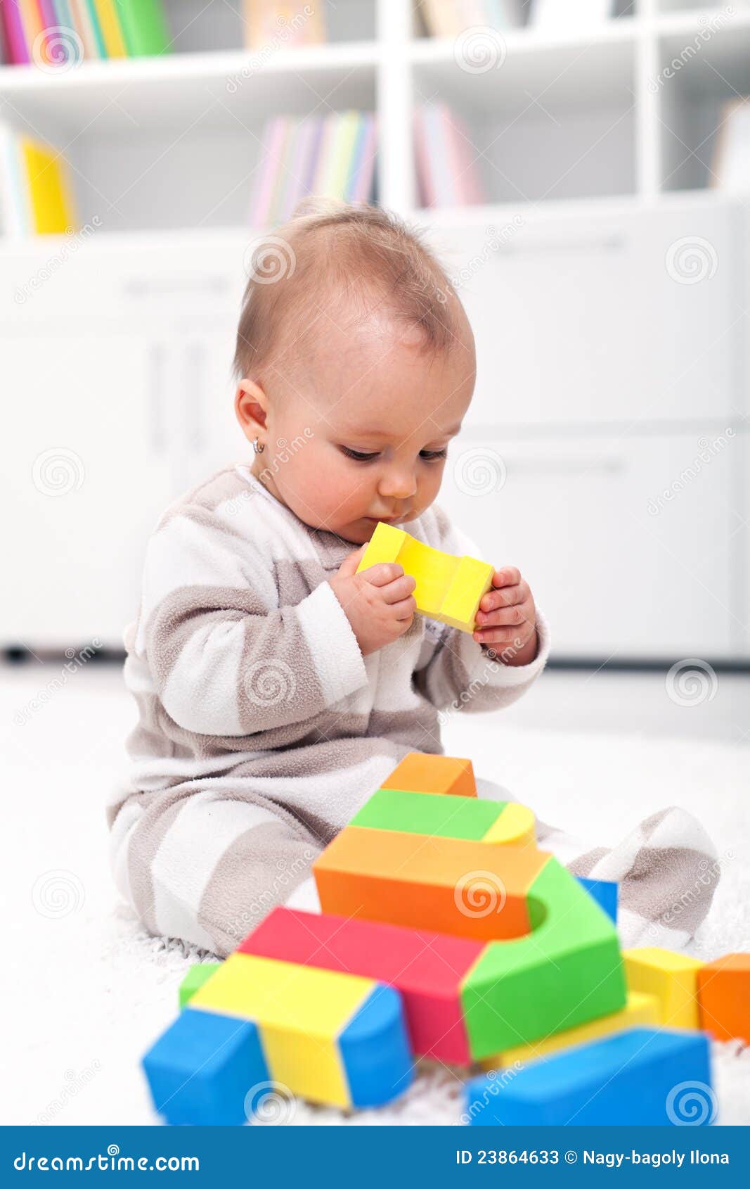 Baby girl playing stock image. Image of baby, curious - 23864633