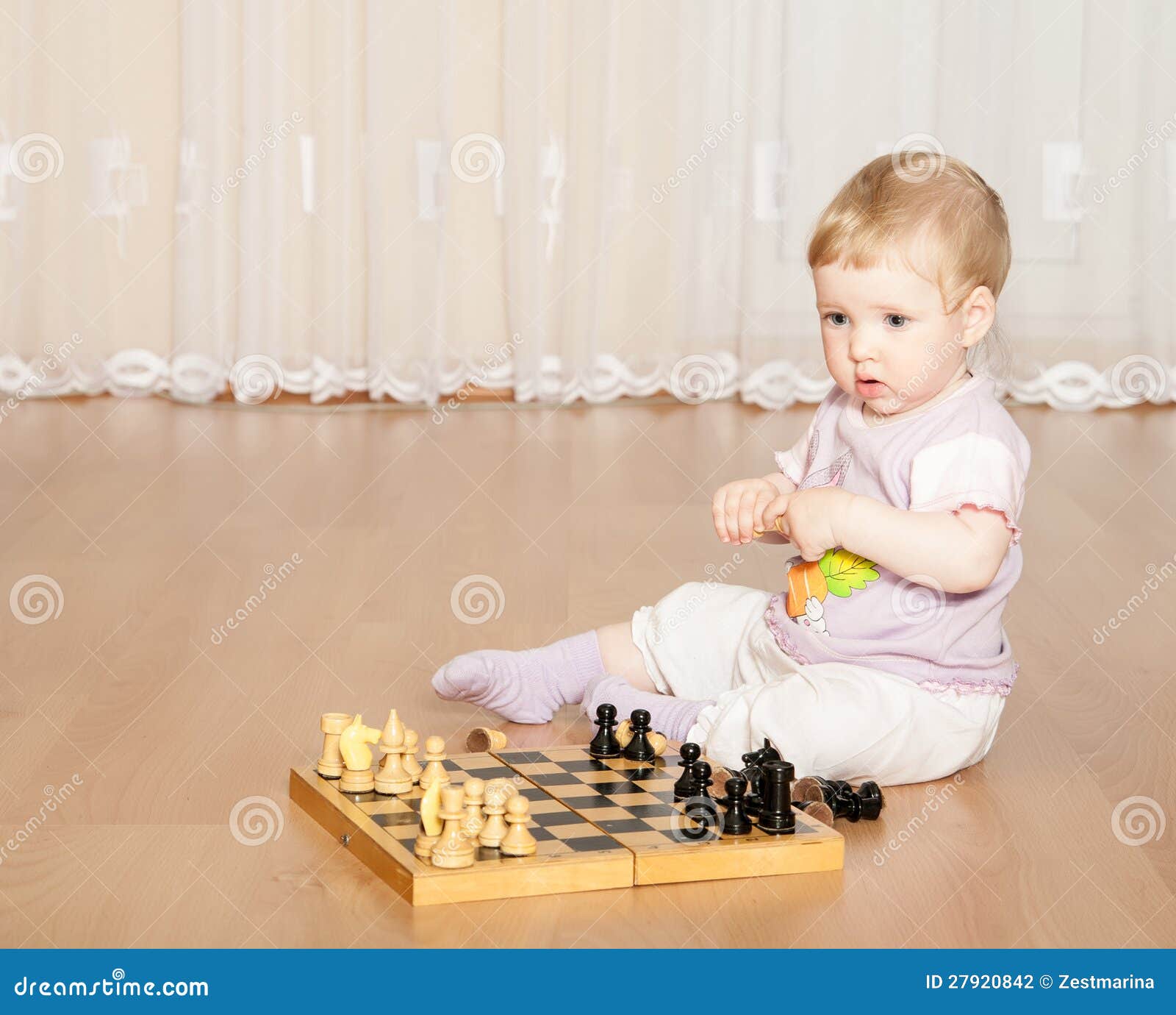 Baby girl playing chess stock photo. Image of home, glad - 27920842