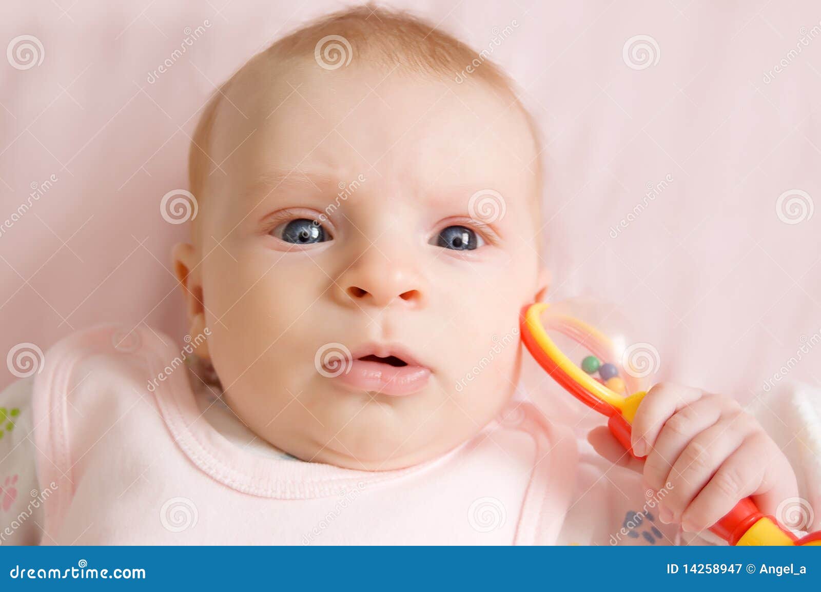 Baby Girl Playing with Rattle Stock Image - Image of baby, portrait ...