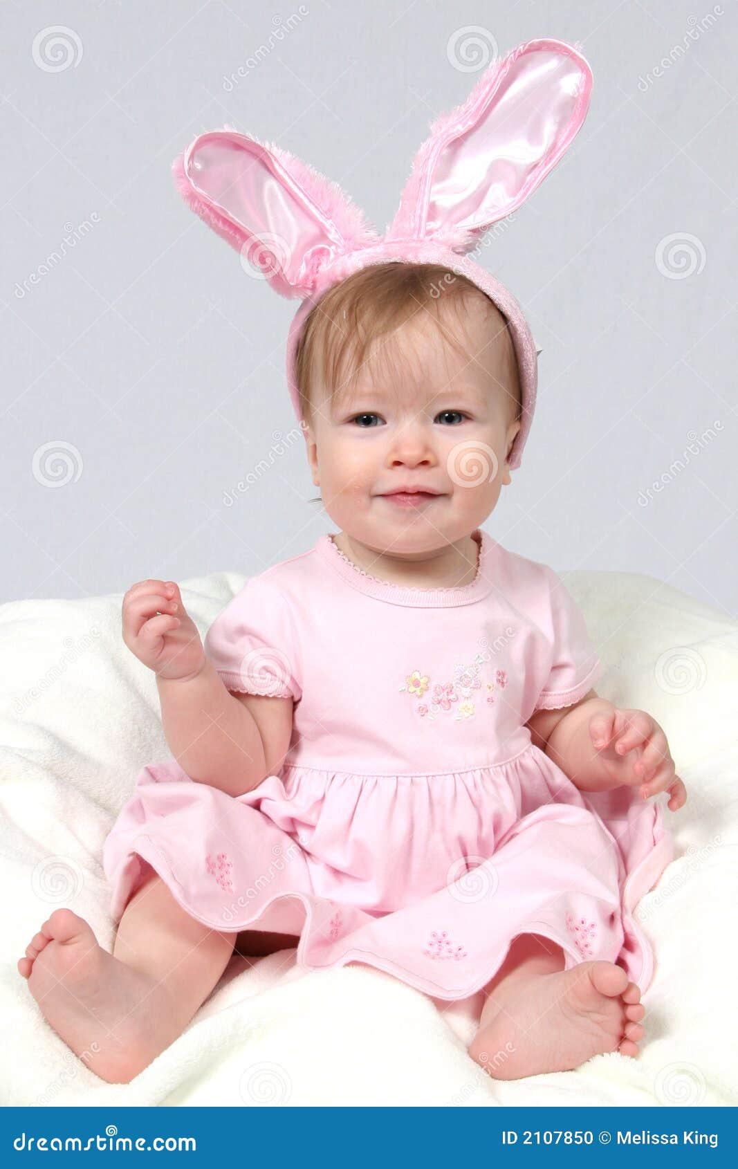Baby Girl with Rabbit Ears stock photo. Image of dress - 2107850