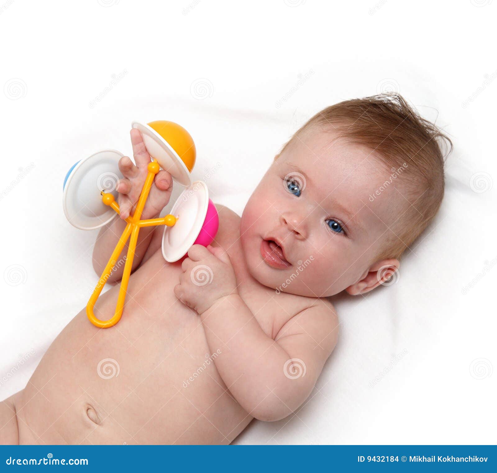 Baby girl with rattle stock photo. Image of action, goods - 9432184