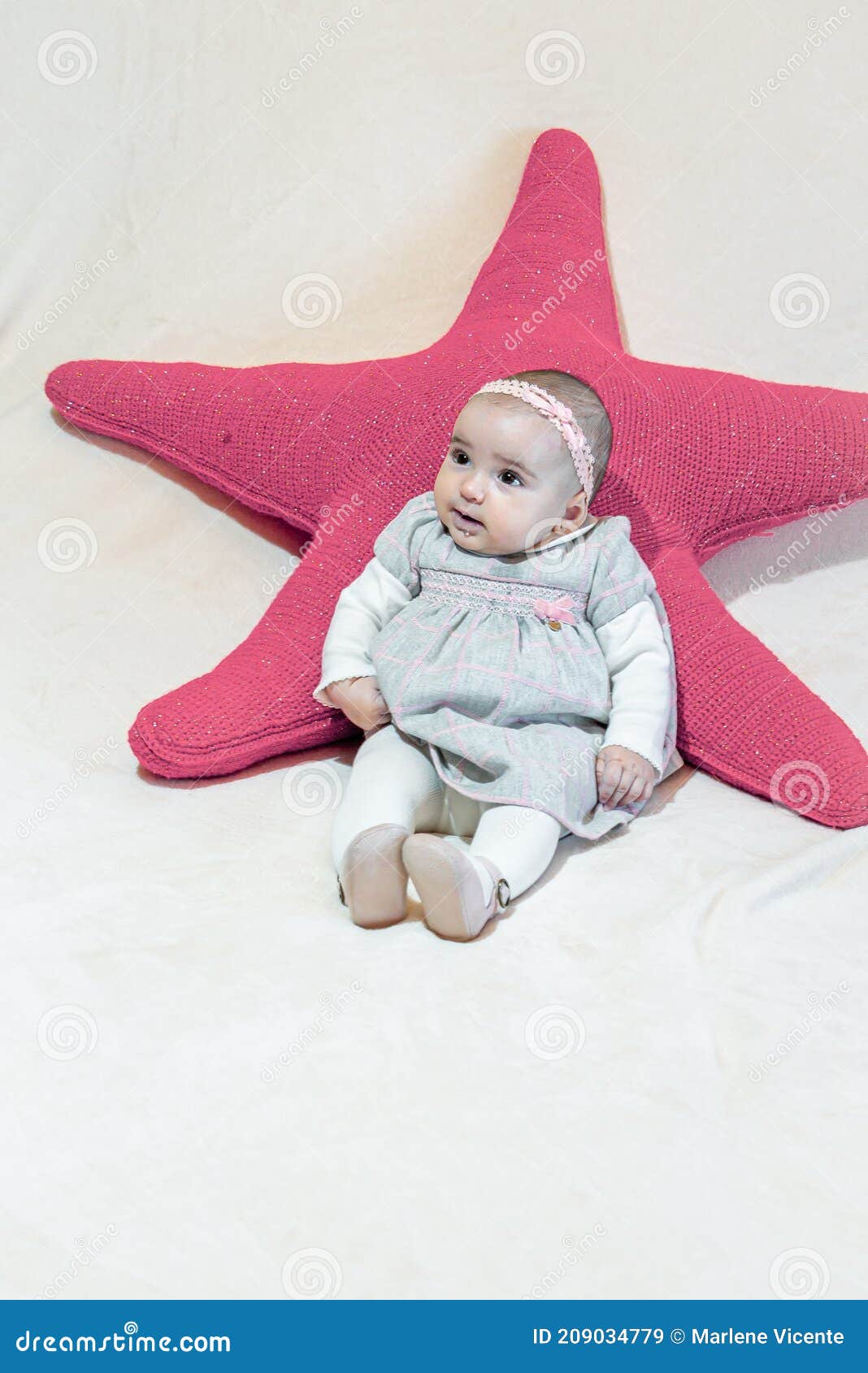 Baby girl on a star stock image. Image of person, generation - 209034779