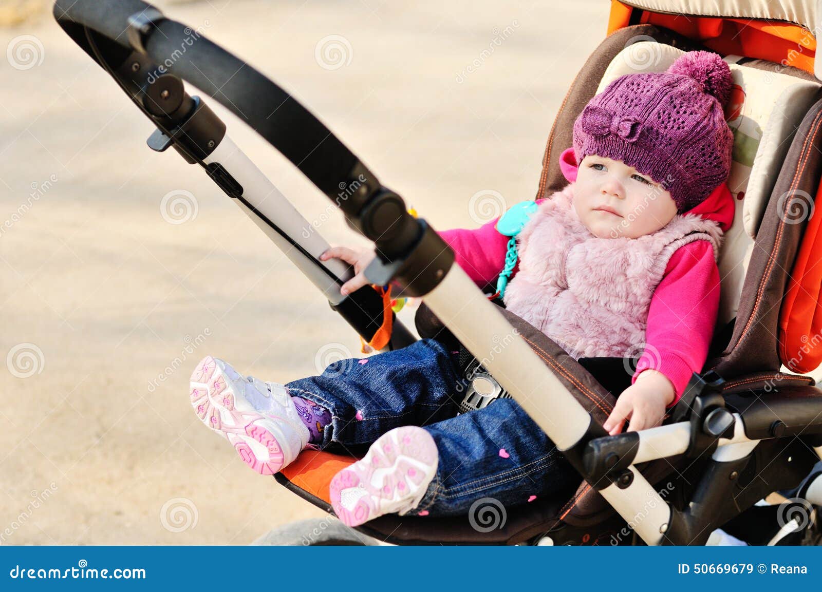 Baby girl in stroller stock image. Image of beret, baby - 50669679