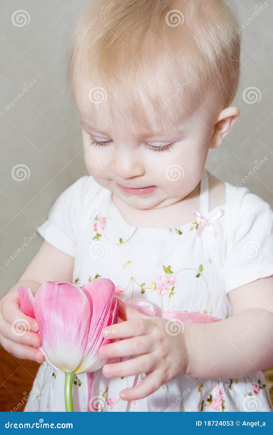 Baby girl with tulip stock image. Image of baby, sweet - 18724053