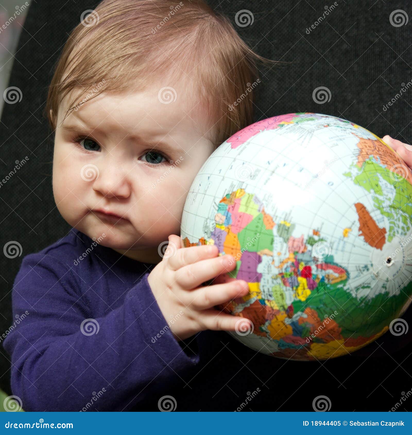 Baby girl with world globe stock image. Image of female - 18944405