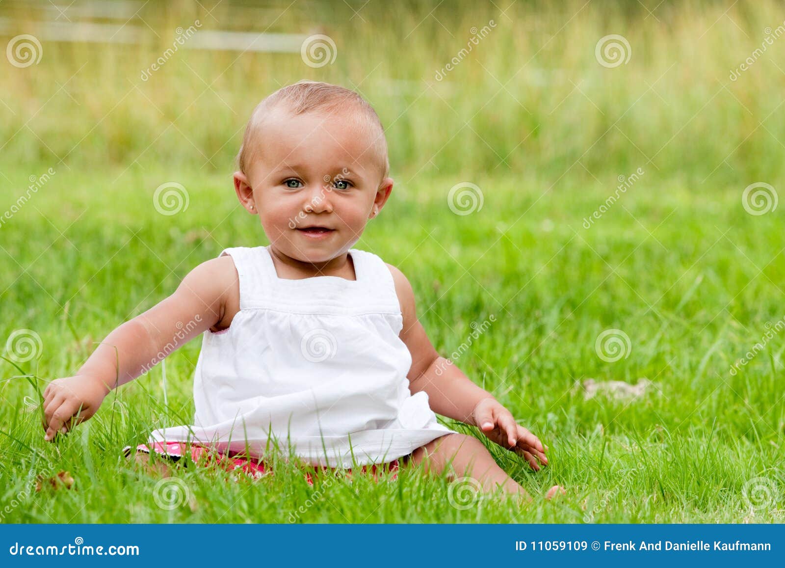 Baby in the grass stock image. Image of childhood, sunny - 11059109