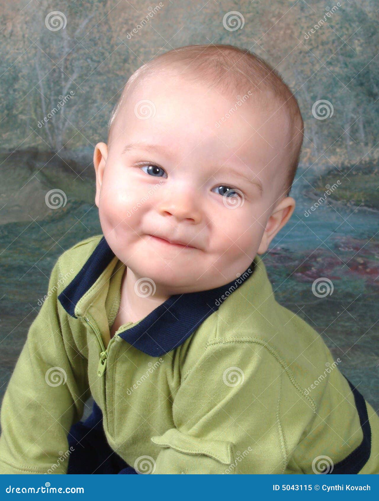 Baby in Green stock image. Image of blue, colors, looks - 5043115