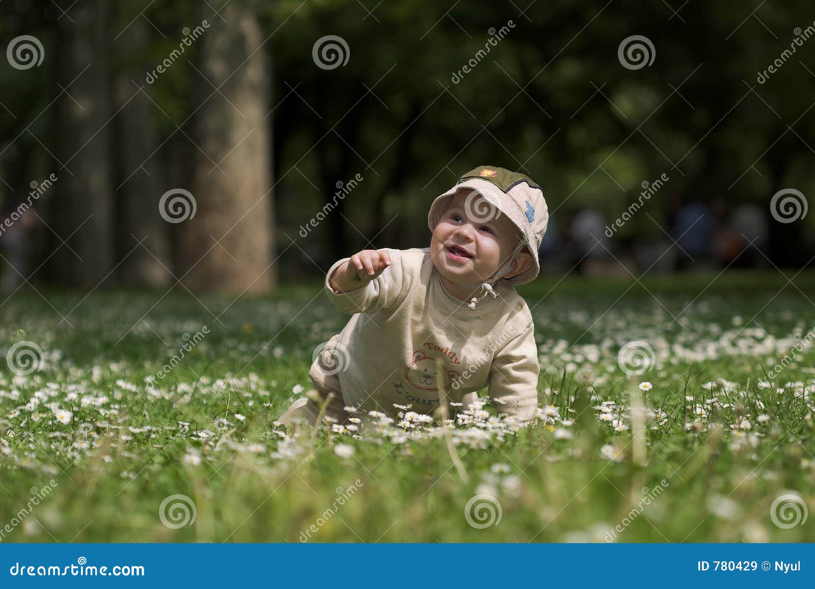 Baby on the green field 5. stock image. Image of link, innocence - 780429