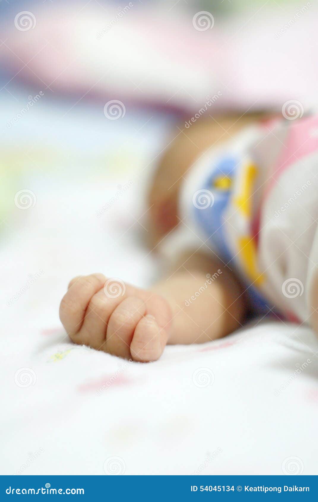 Baby hand on the bed stock photo. Image of baby, growth - 54045134