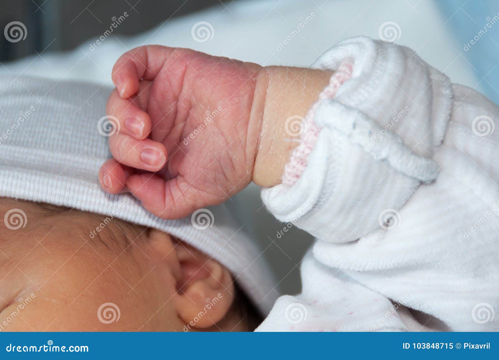 Baby hand in the bed stock image. Image of people, bright - 103848715