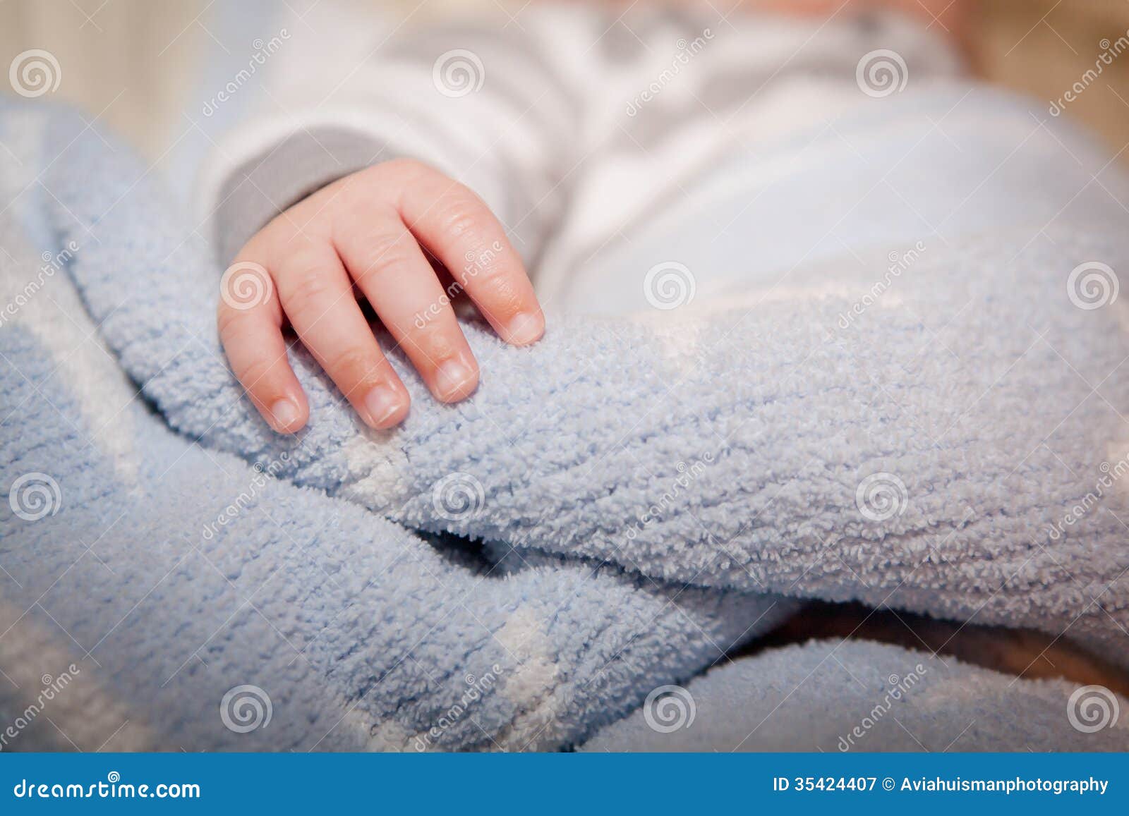 Baby Hand on Blanket stock image. Image of loving, focus - 35424407