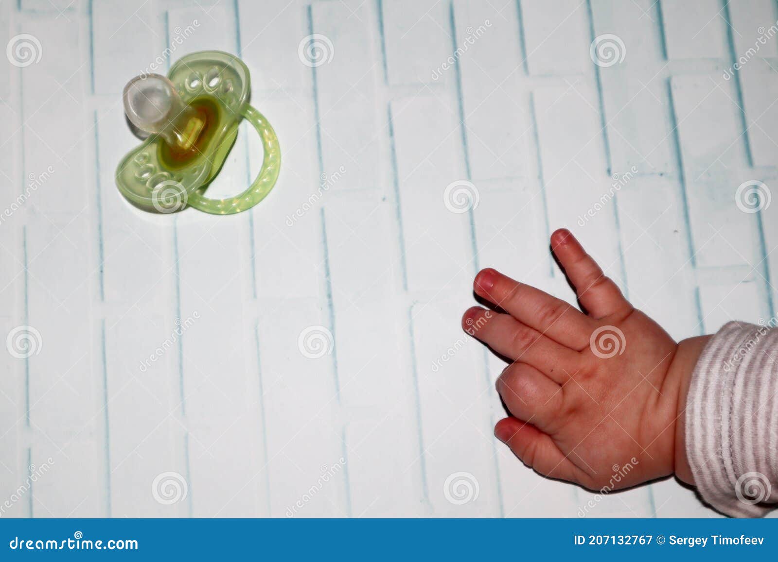 Baby Hand Reaching for a Pacifier Closeup Stock Image - Image of person ...