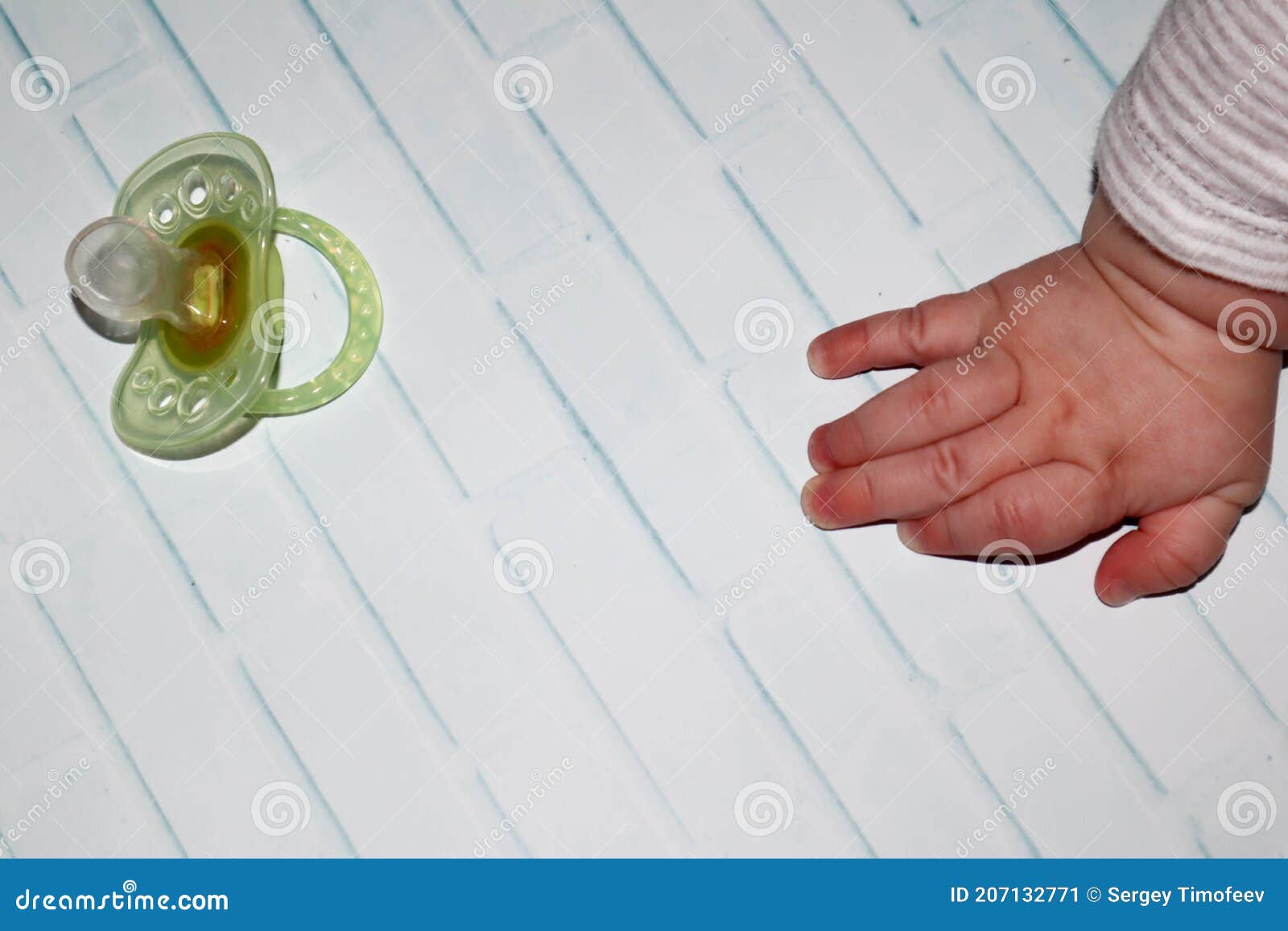 Baby Hand Reaching for a Pacifier Closeup Stock Image - Image of little ...