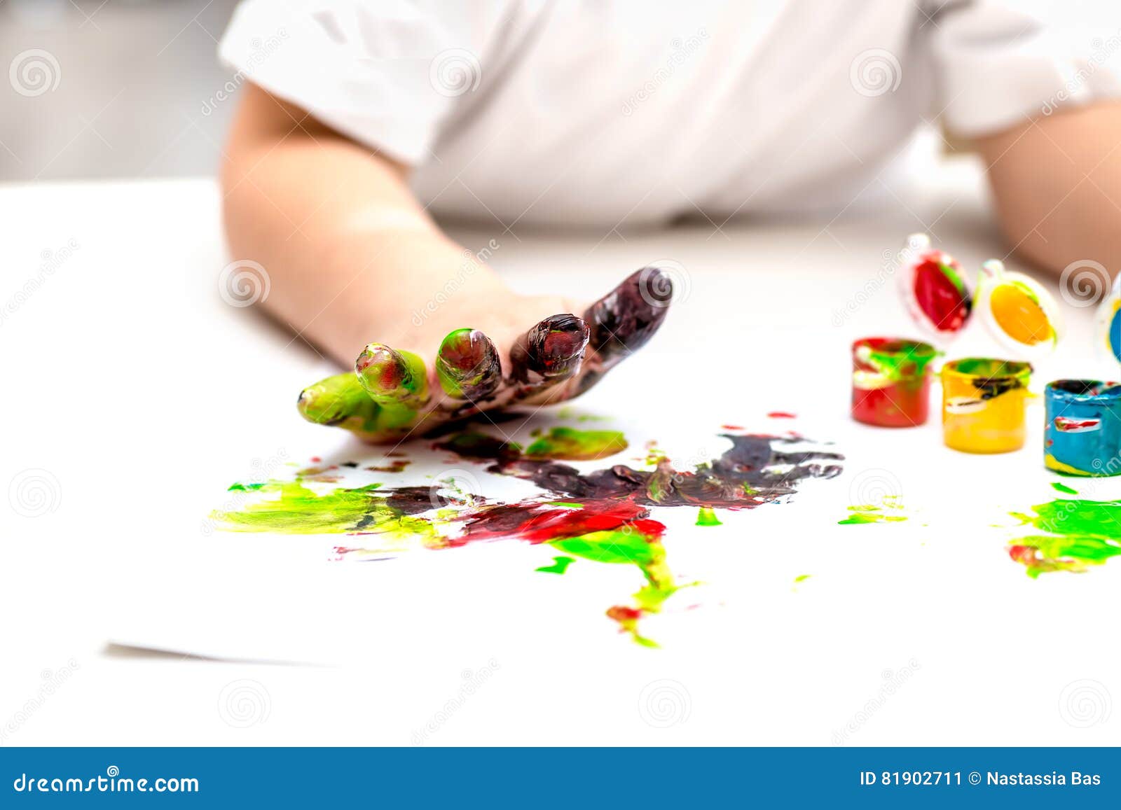 Baby hand smeared in paint stock image. Image of painter - 81902711