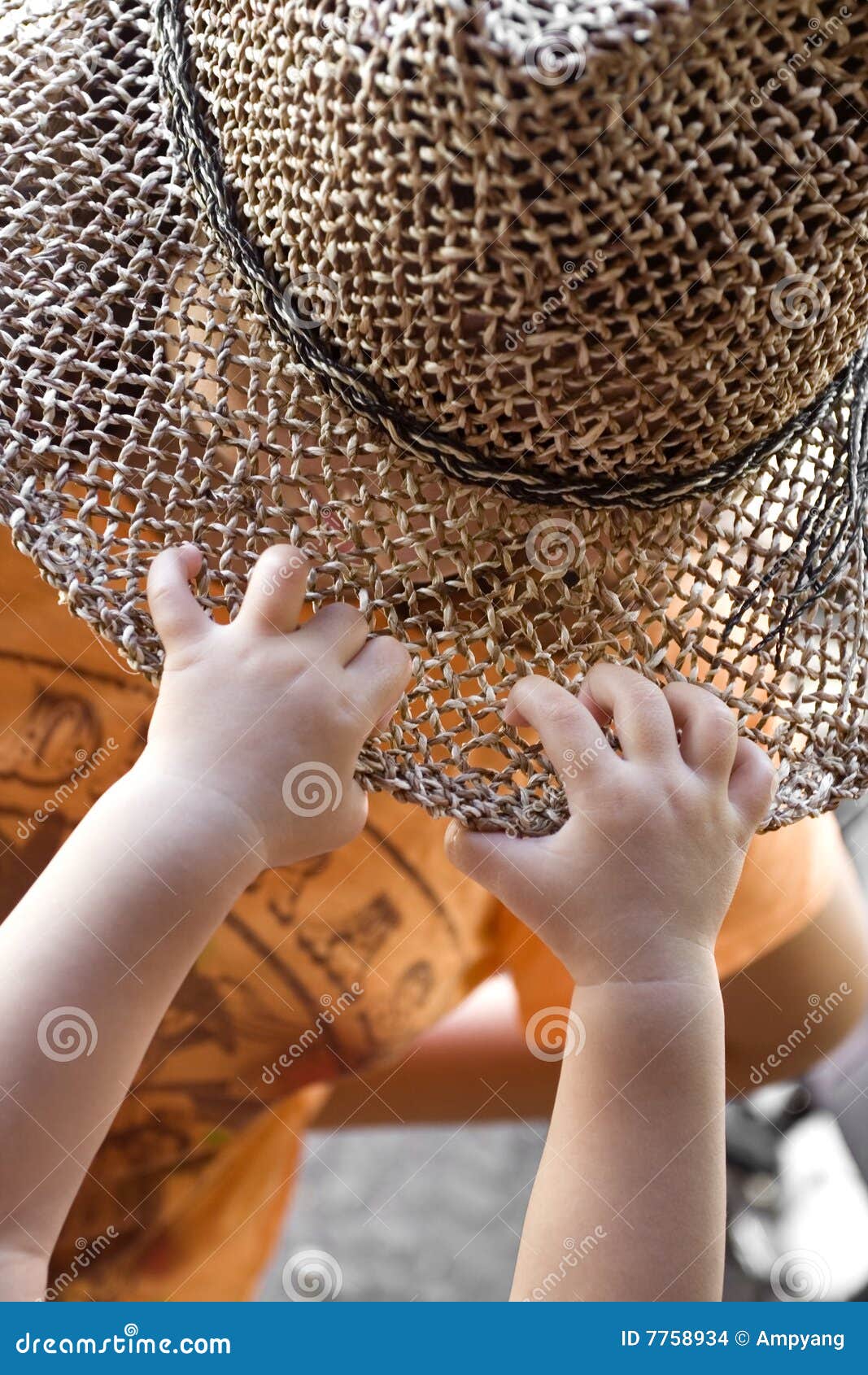 Baby hands grab a hat stock photo. Image of grab, reaching - 7758934