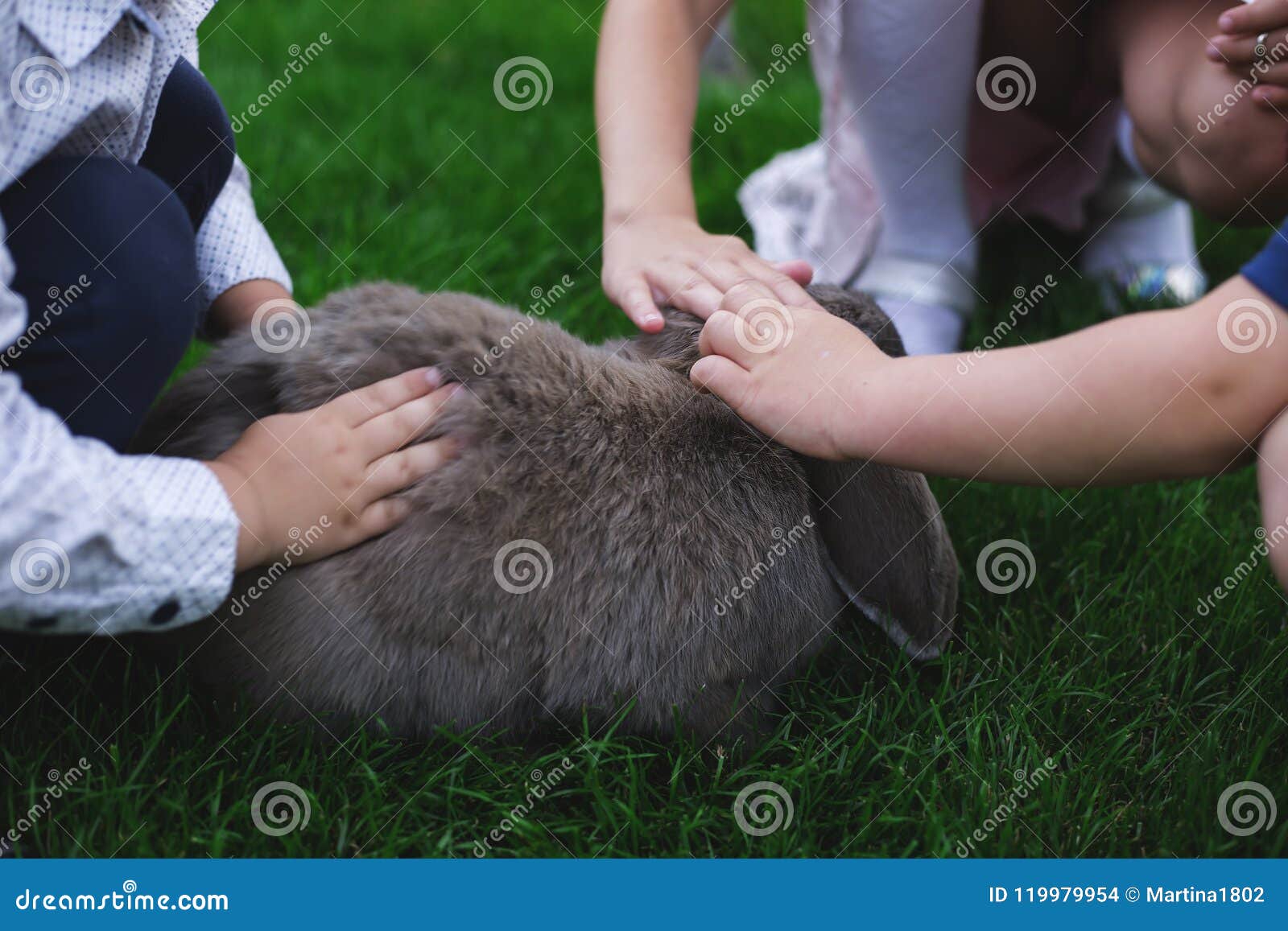 Big rabbit and children stock photo. Image of handle - 119979954
