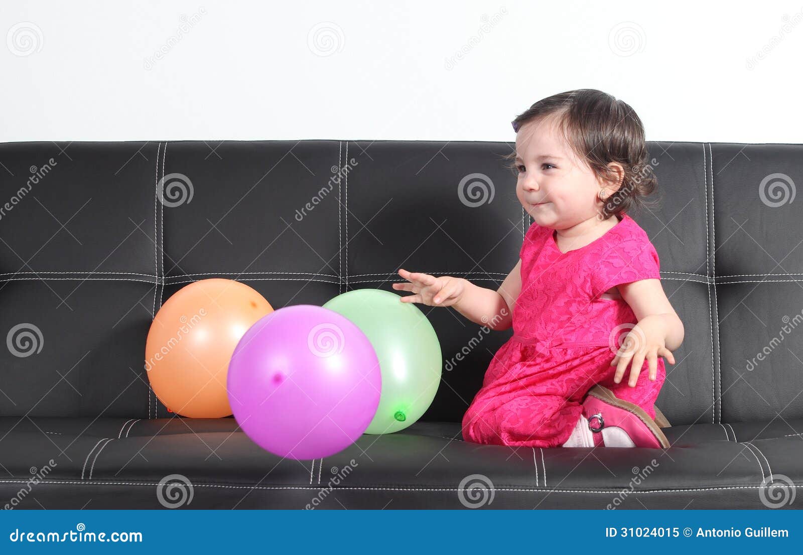 Baby Happy Playing with Balloons Stock Image - Image of balloon, couch ...