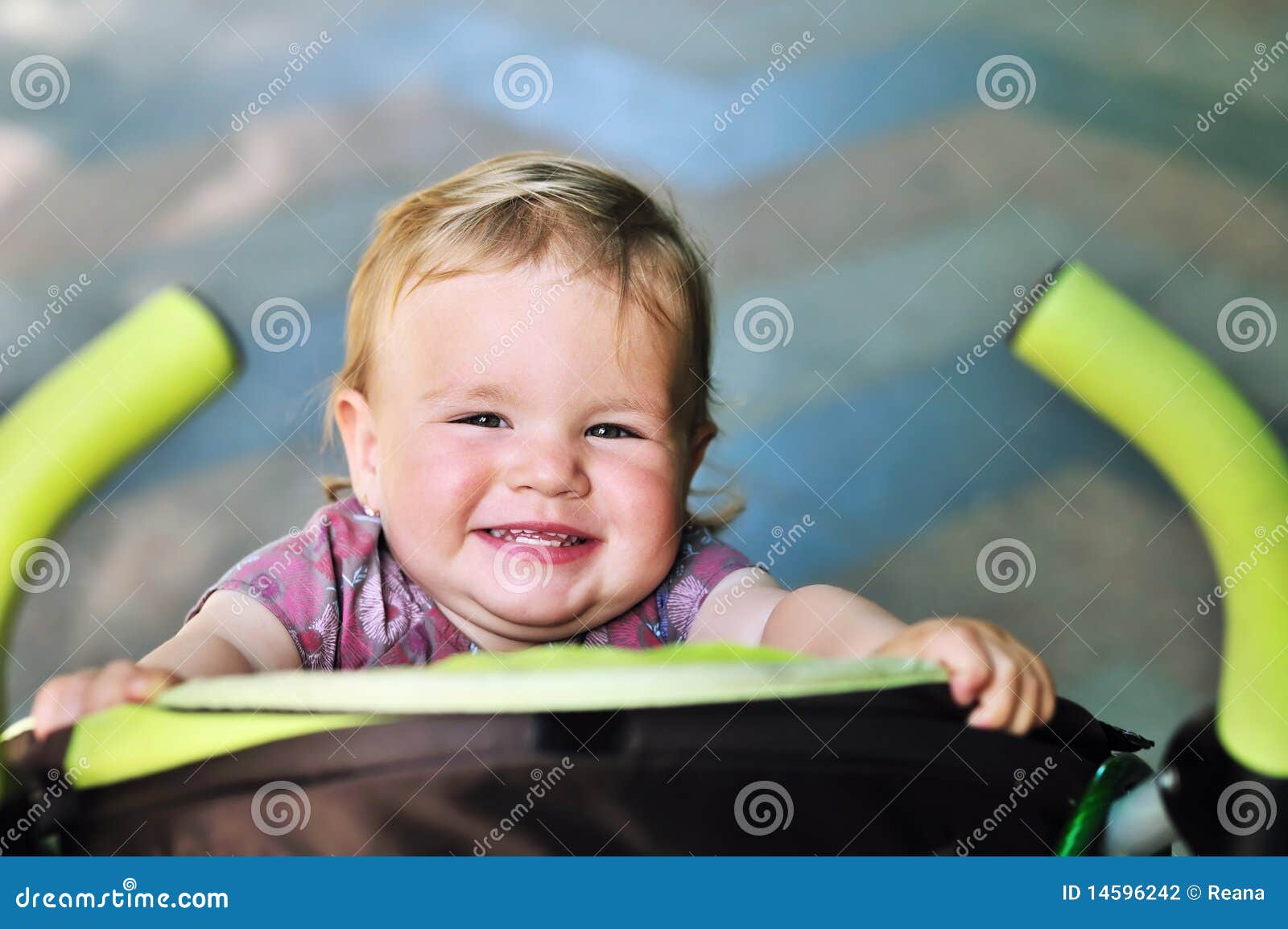 Baby Having Fun in the Stroller Stock Photo - Image of joyful, activity ...