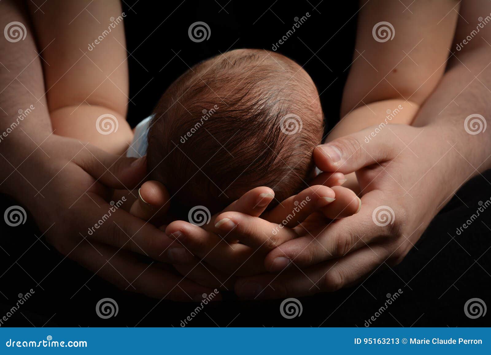 Baby held by parents hands stock image. Image of daddy - 95163213