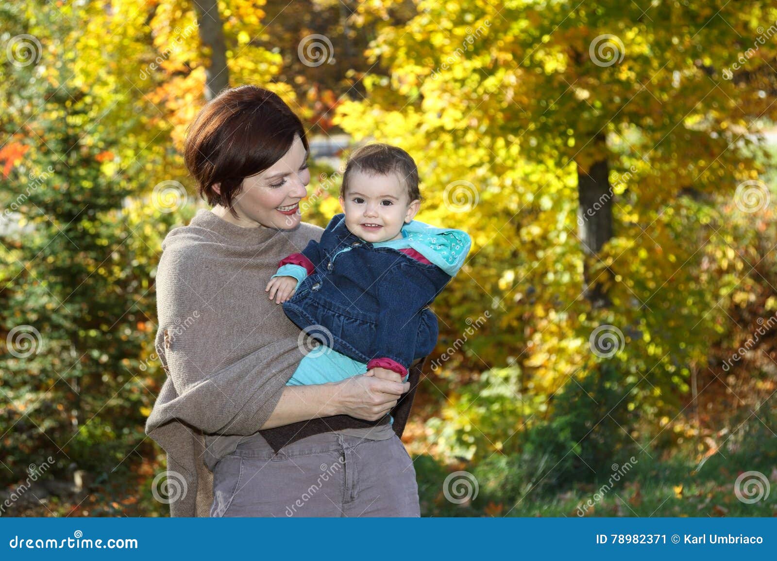 Baby and Her Mother during Fall Stock Image - Image of mother, nature ...