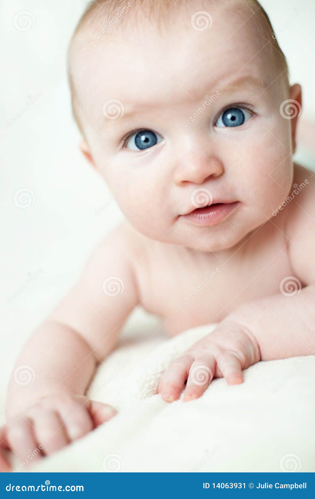 Baby on His Tummy Looking Up Stock Image - Image of brown, baby: 14063931
