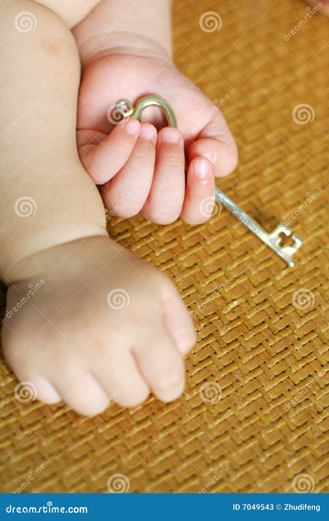 Baby hold gold key stock image. Image of investment, real - 7049543