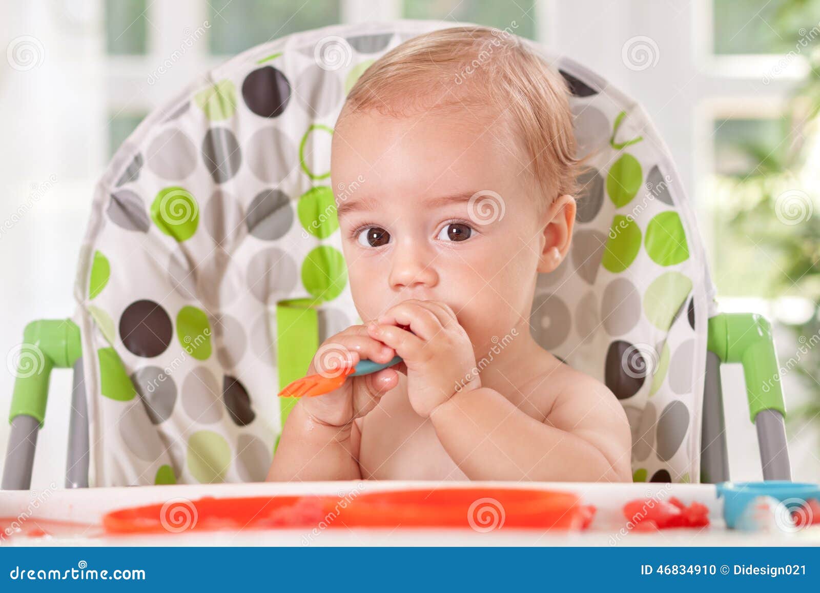 Baby Holding Fork and Eating Fruit Stock Photo - Image of color, eyes ...