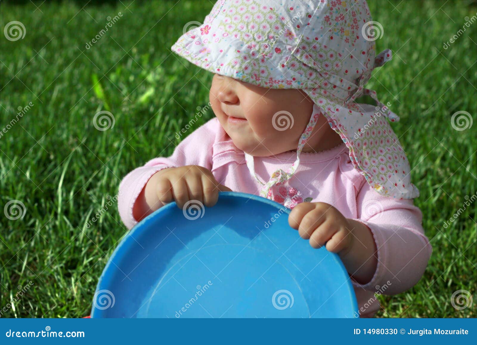 Baby holding frisbee stock photo. Image of girl, summer - 14980330