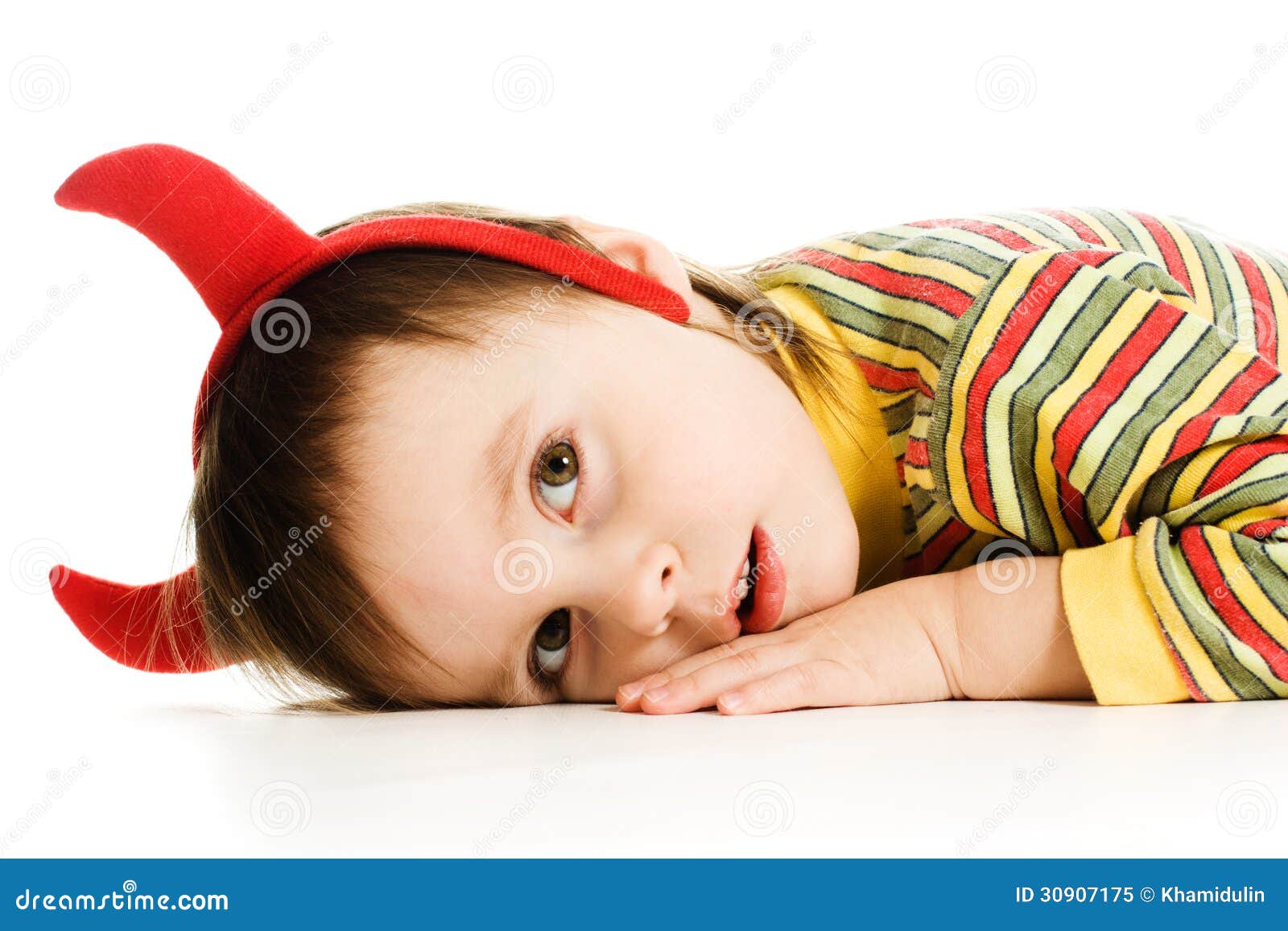 Baby with Horns Imp Sleeps on the Floor Stock Image - Image of happy ...