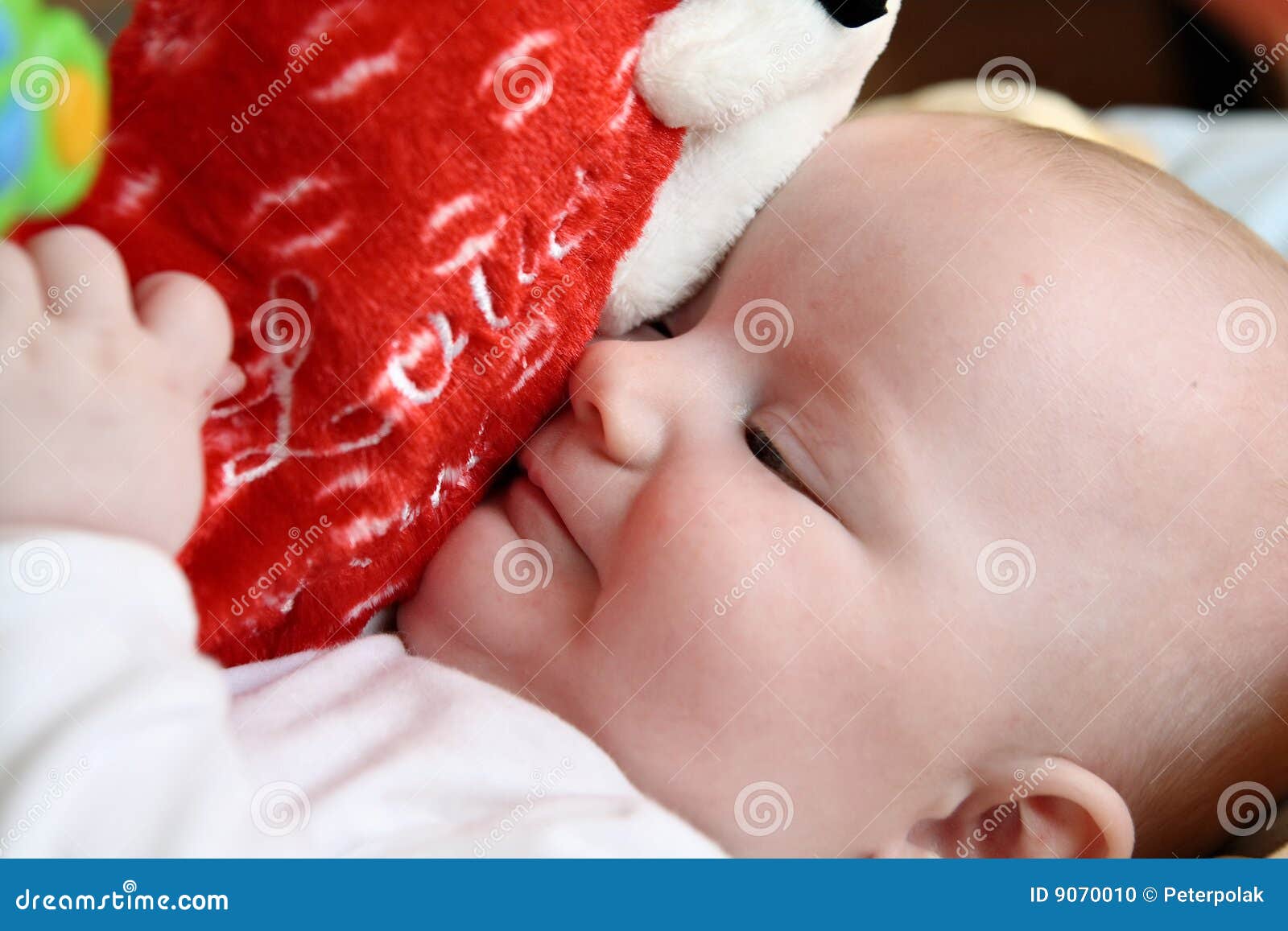 Baby Hugging Big Plush Heart Stock Photo - Image of plush, closed: 9070010