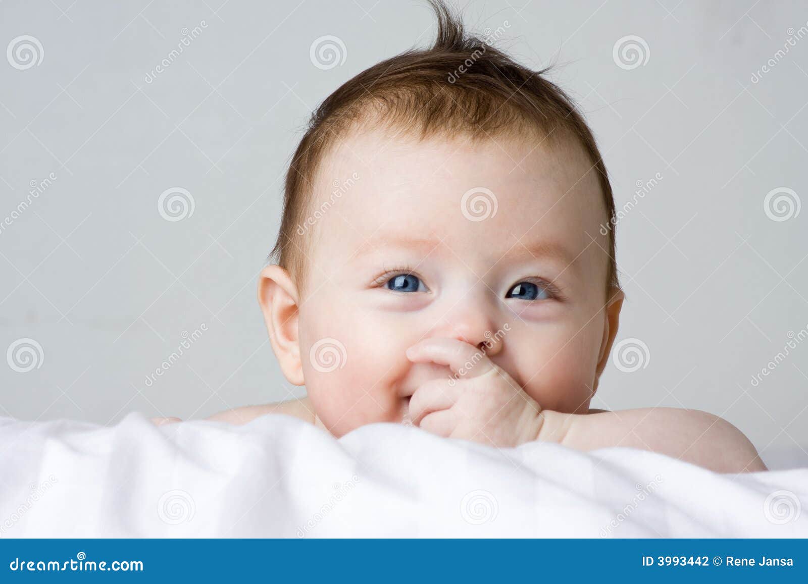 Sad Infant Girl Gnawing Baby Cot. Little Baby Cry In Bed Royalty-Free ...