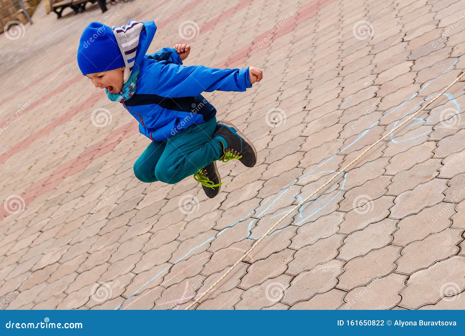Baby jumps high stock photo. Image of adorable, play - 161650822