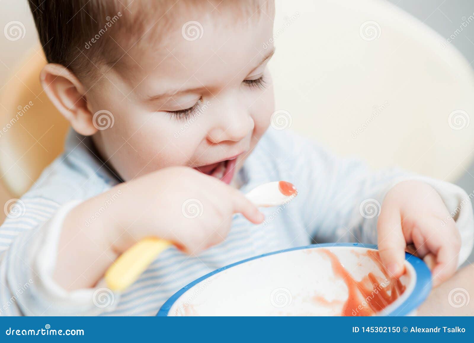 Baby in the Kitchen Eating Fruit Puree Stock Photo - Image of beautiful ...