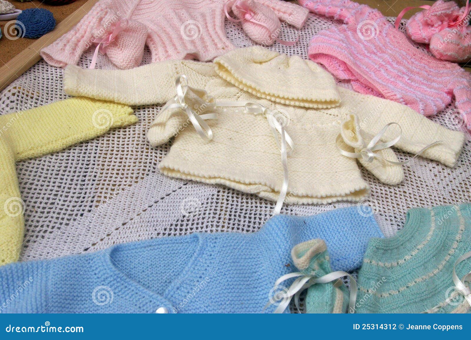 Baby knitted clothes; stock photo. Image of booties, bind - 25314312