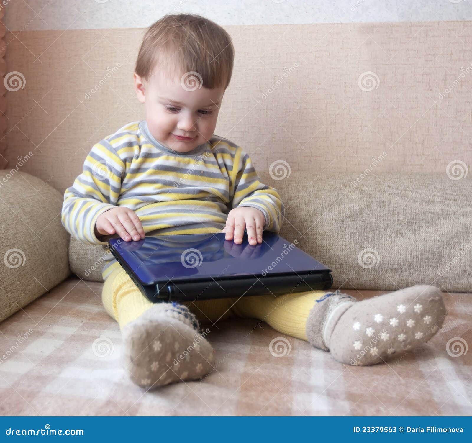 Baby with laptop stock image. Image of toddler, playing - 23379563