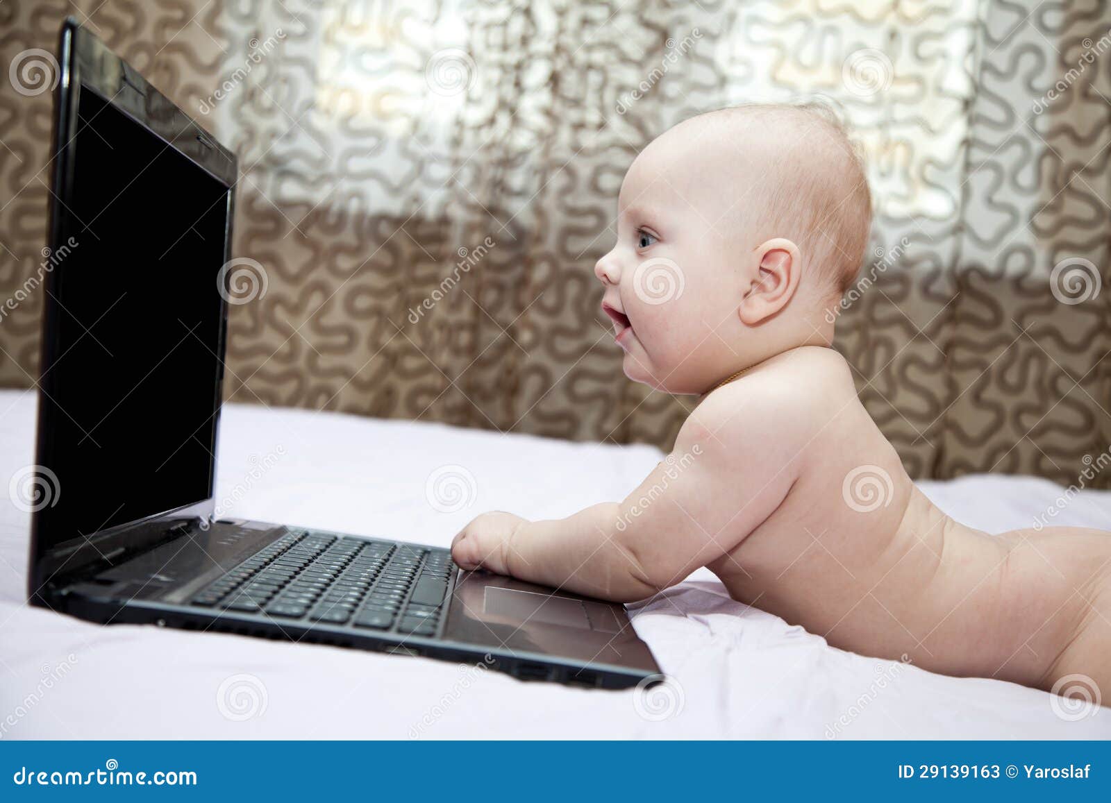 Baby a laptop. stock image. Image of computers, making - 29139163