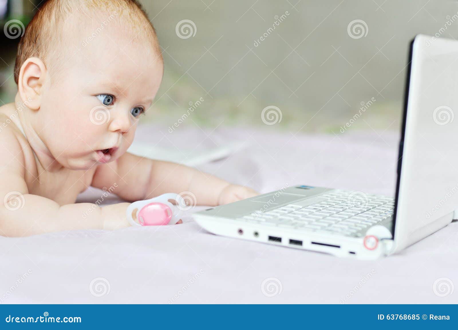 Baby with laptop at home stock image. Image of learning - 63768685
