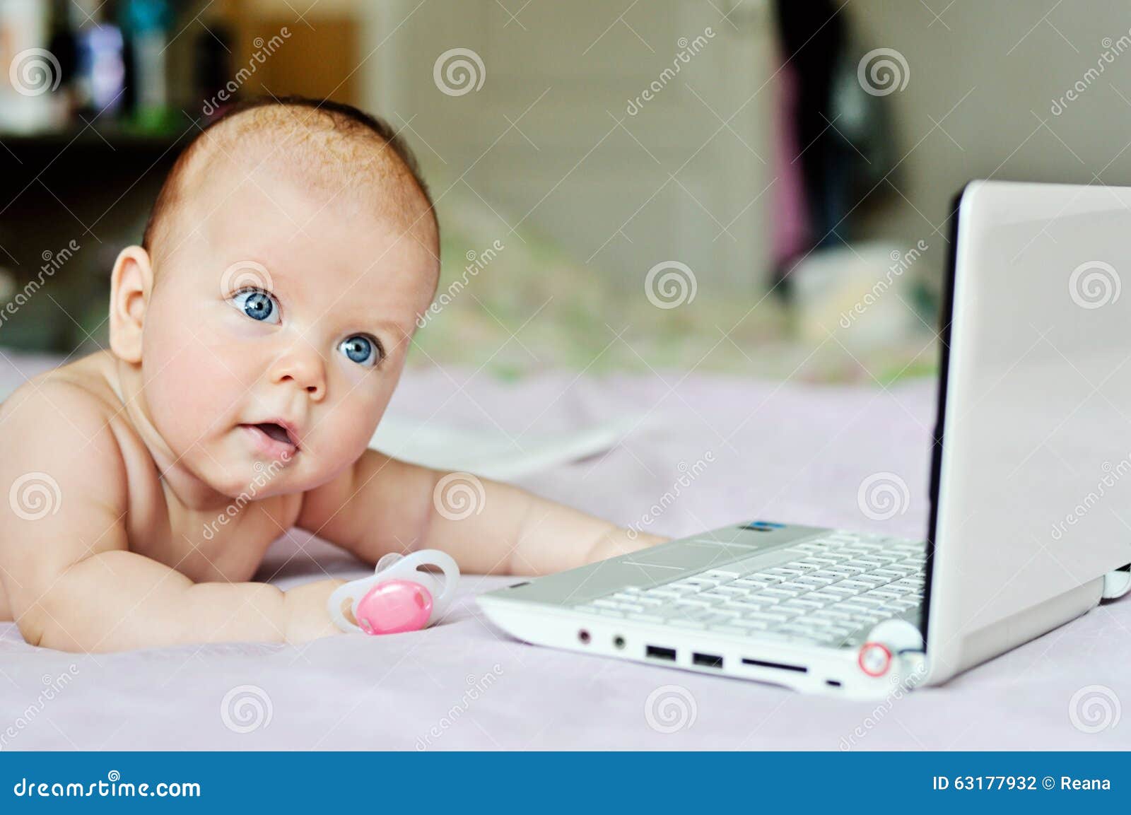 Baby with laptop stock photo. Image of happiness, play - 63177932