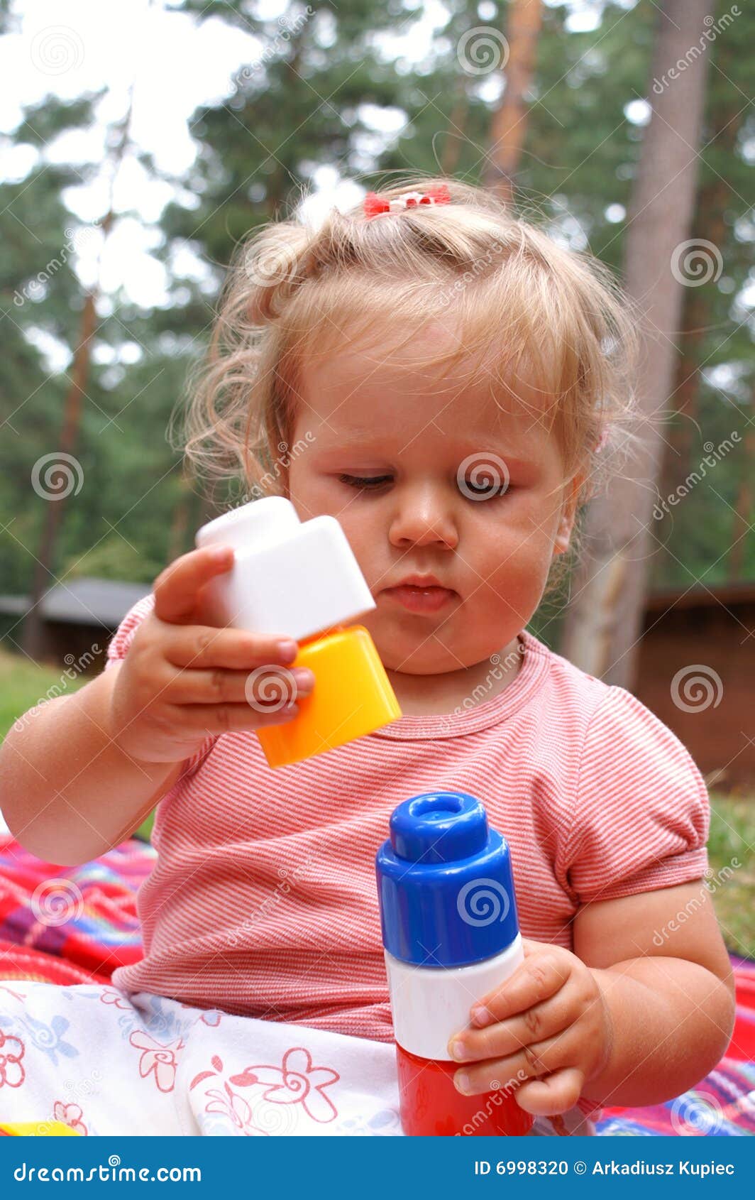 Baby lays blocks stock photo. Image of determination, girl - 6998320