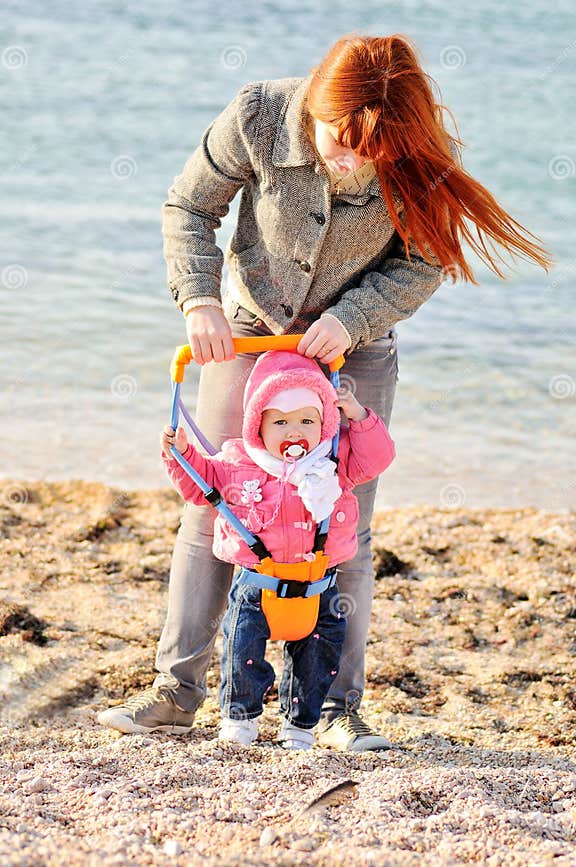 Baby in leading strings stock image. Image of caucasian - 34079975