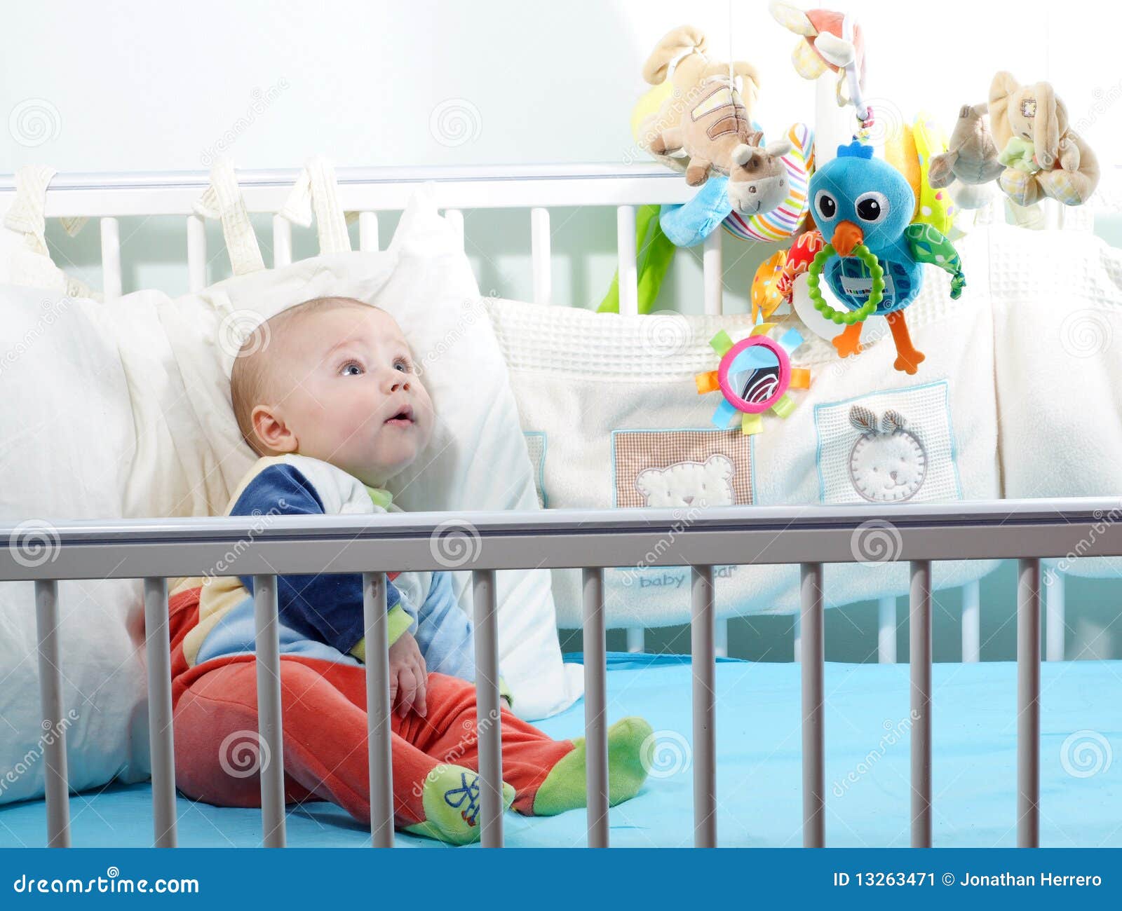Baby Learning through Senses in Cot Stock Image - Image of innocent ...