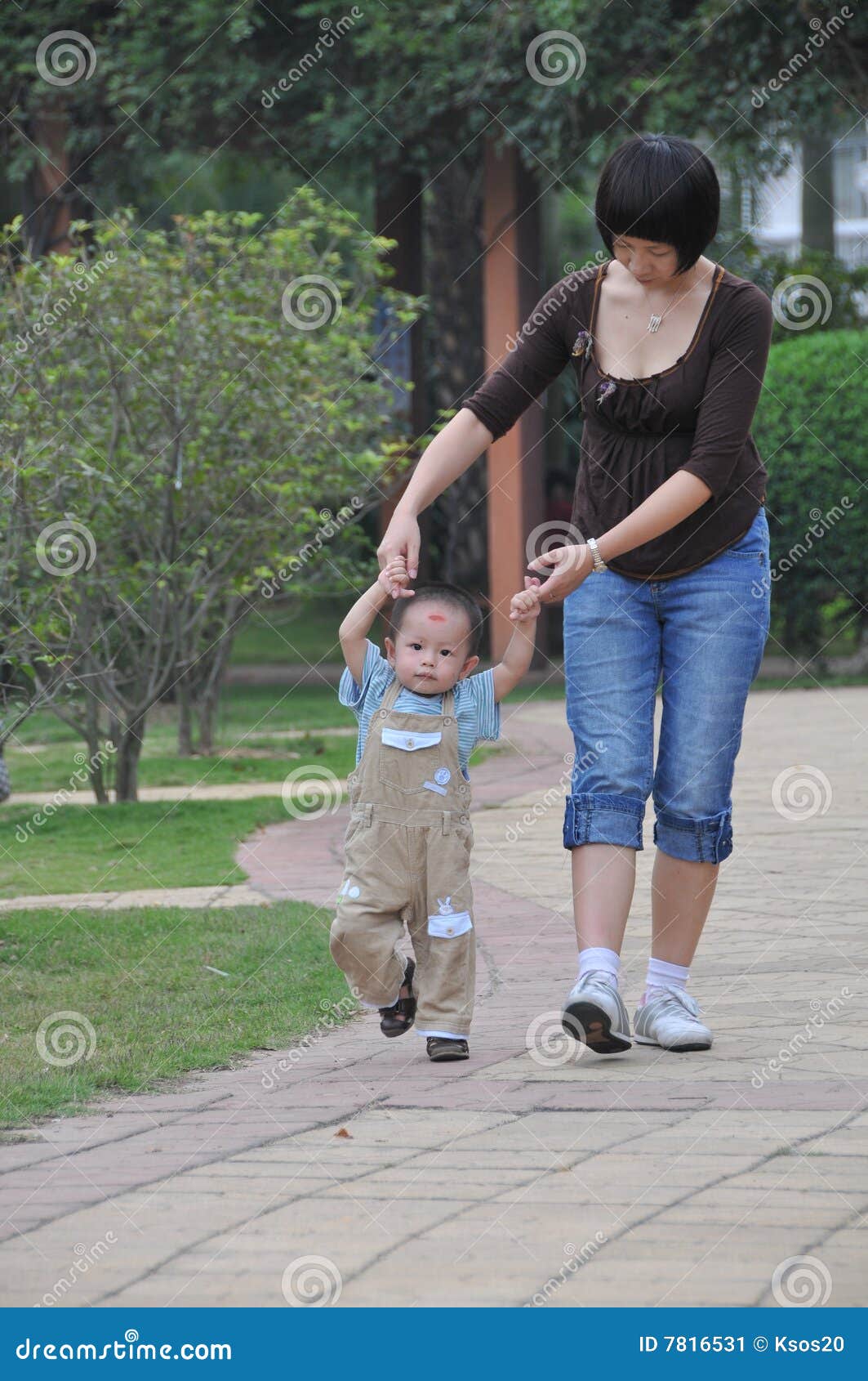 A baby learning to walk stock image. Image of boys, walking - 7816531