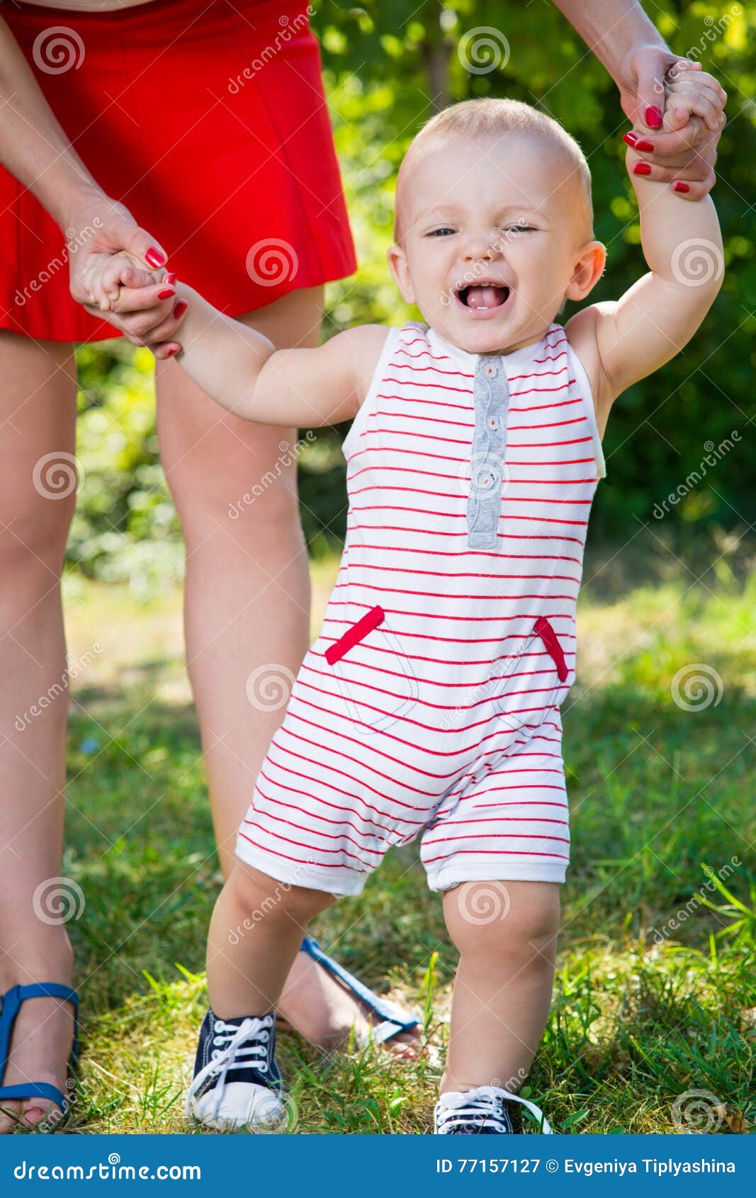 Baby learning to walk stock image. Image of baby, grass - 77157127