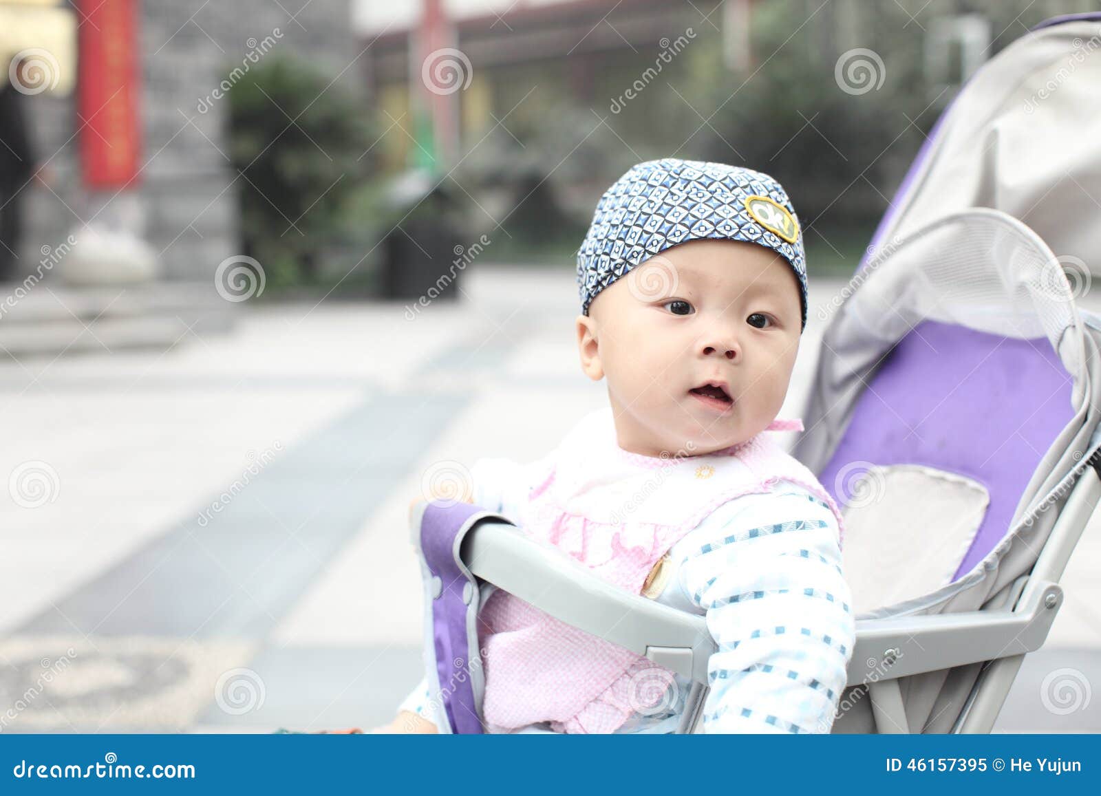 Baby looking back stock image. Image of hand, pretty - 46157395