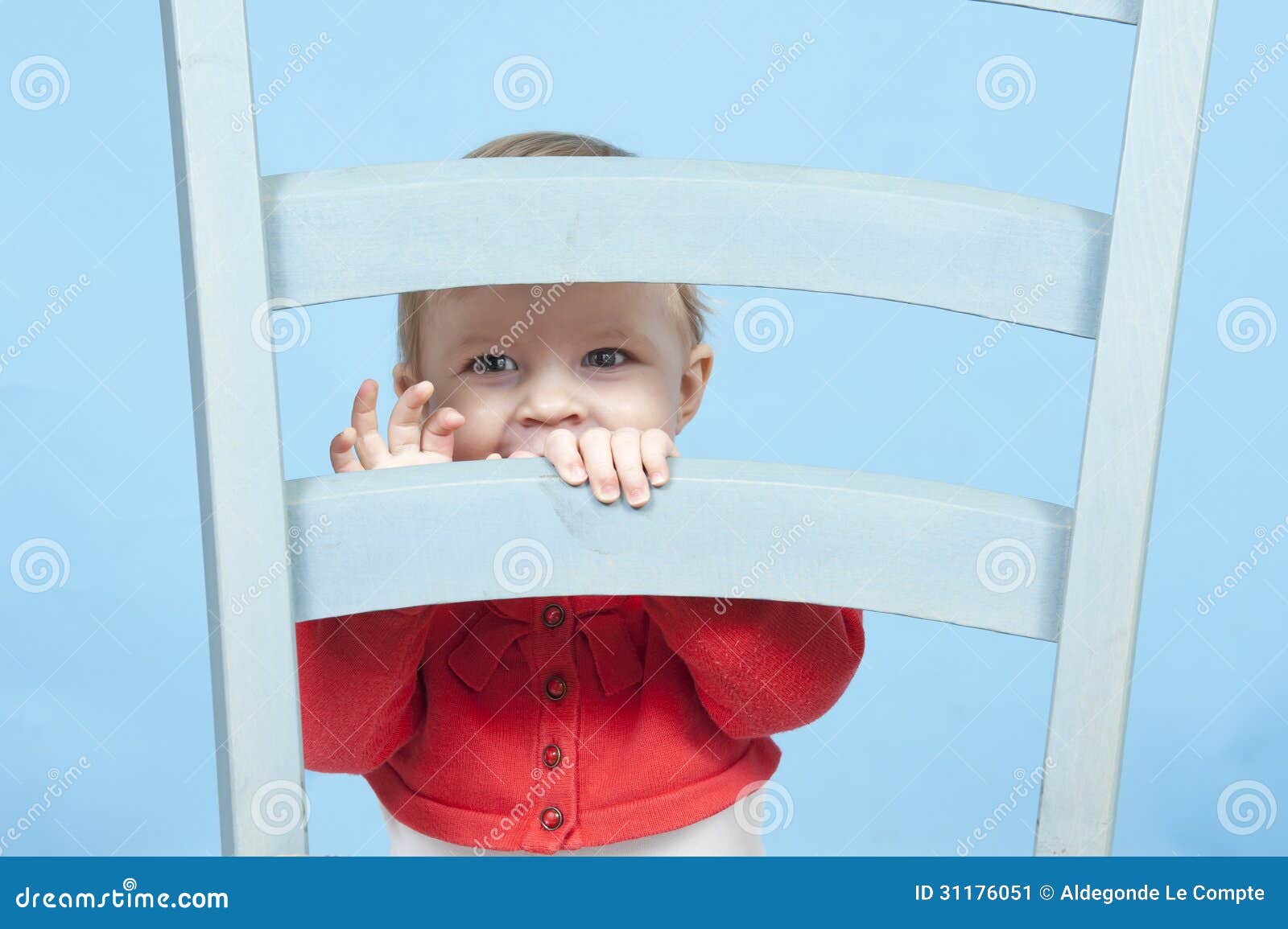 Baby Looking from Behind a Chair Stock Image - Image of caucasian ...