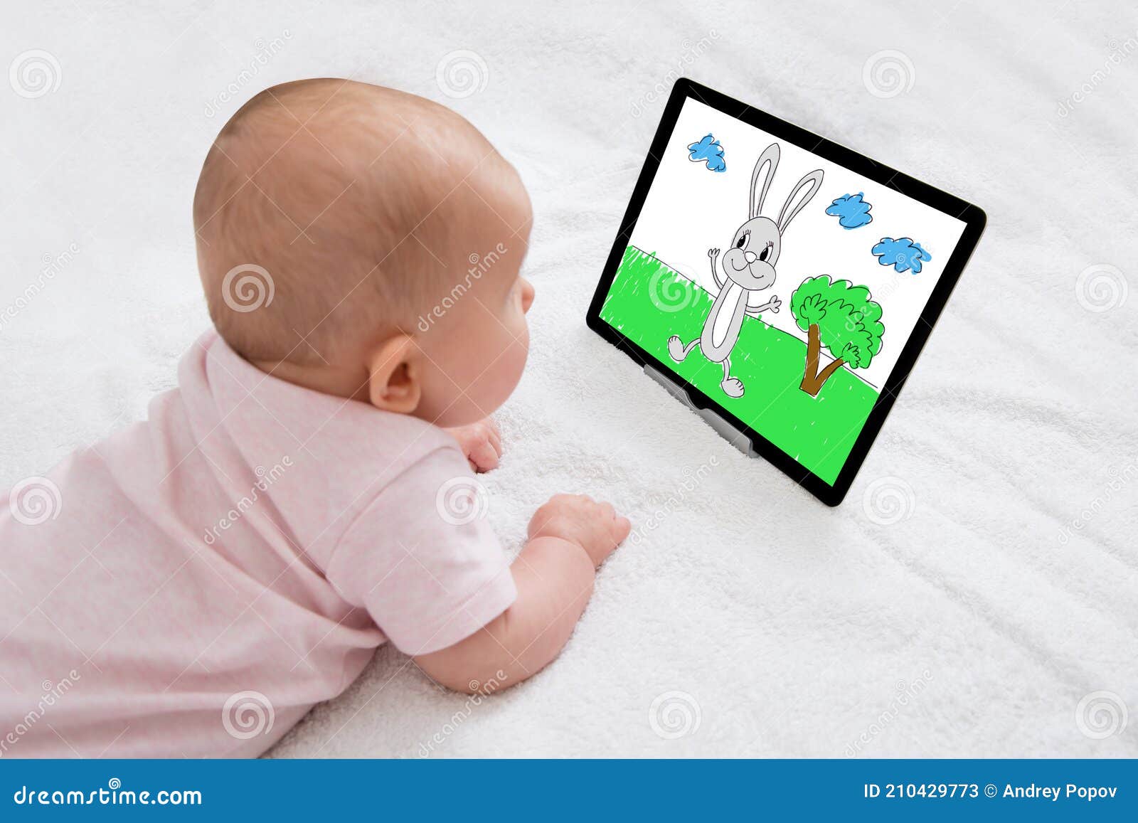Baby Watching Cartoon on Tablet Stock Image - Image of display ...
