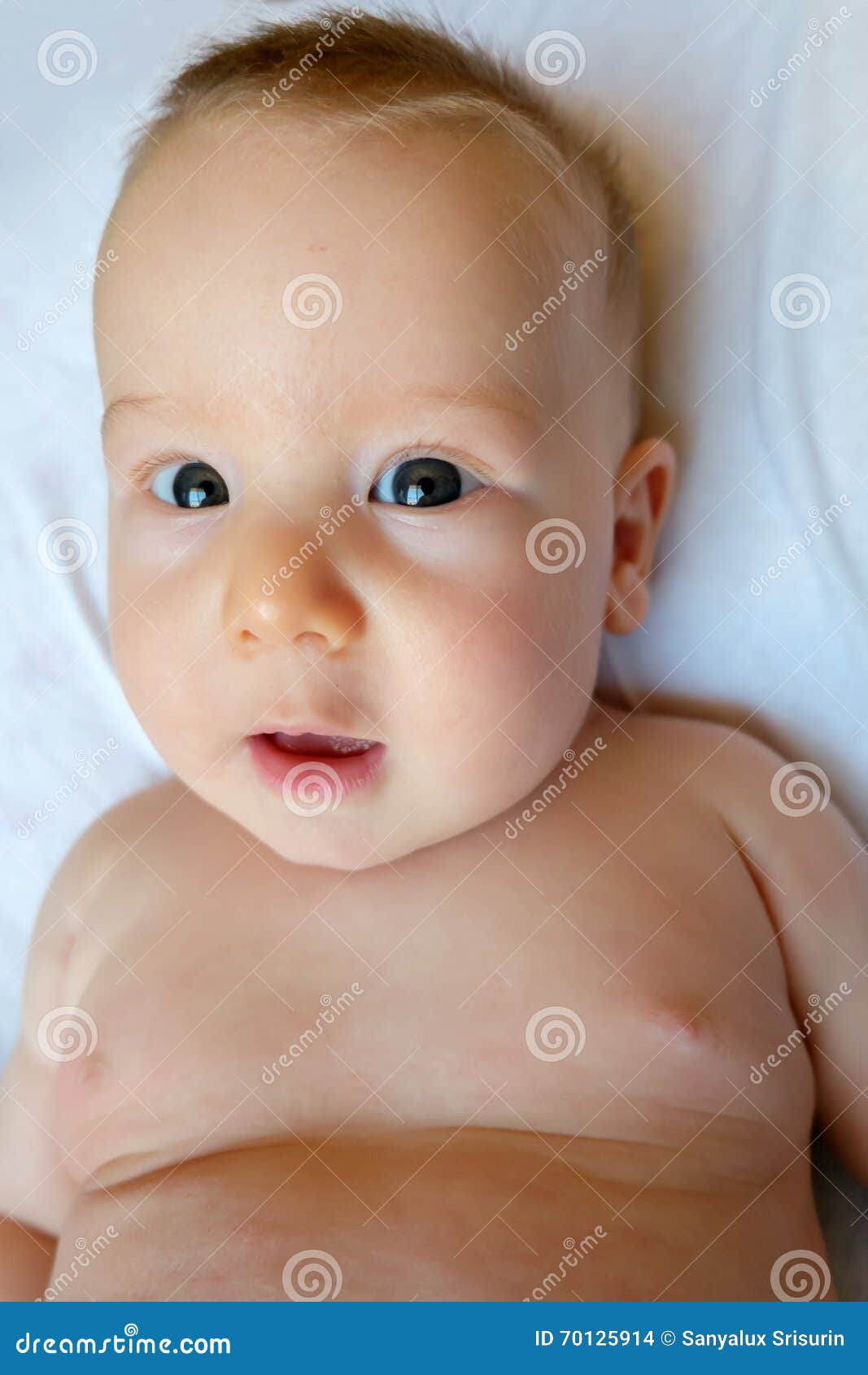 Baby looking stock photo. Image of parenthood, emotion - 70125914