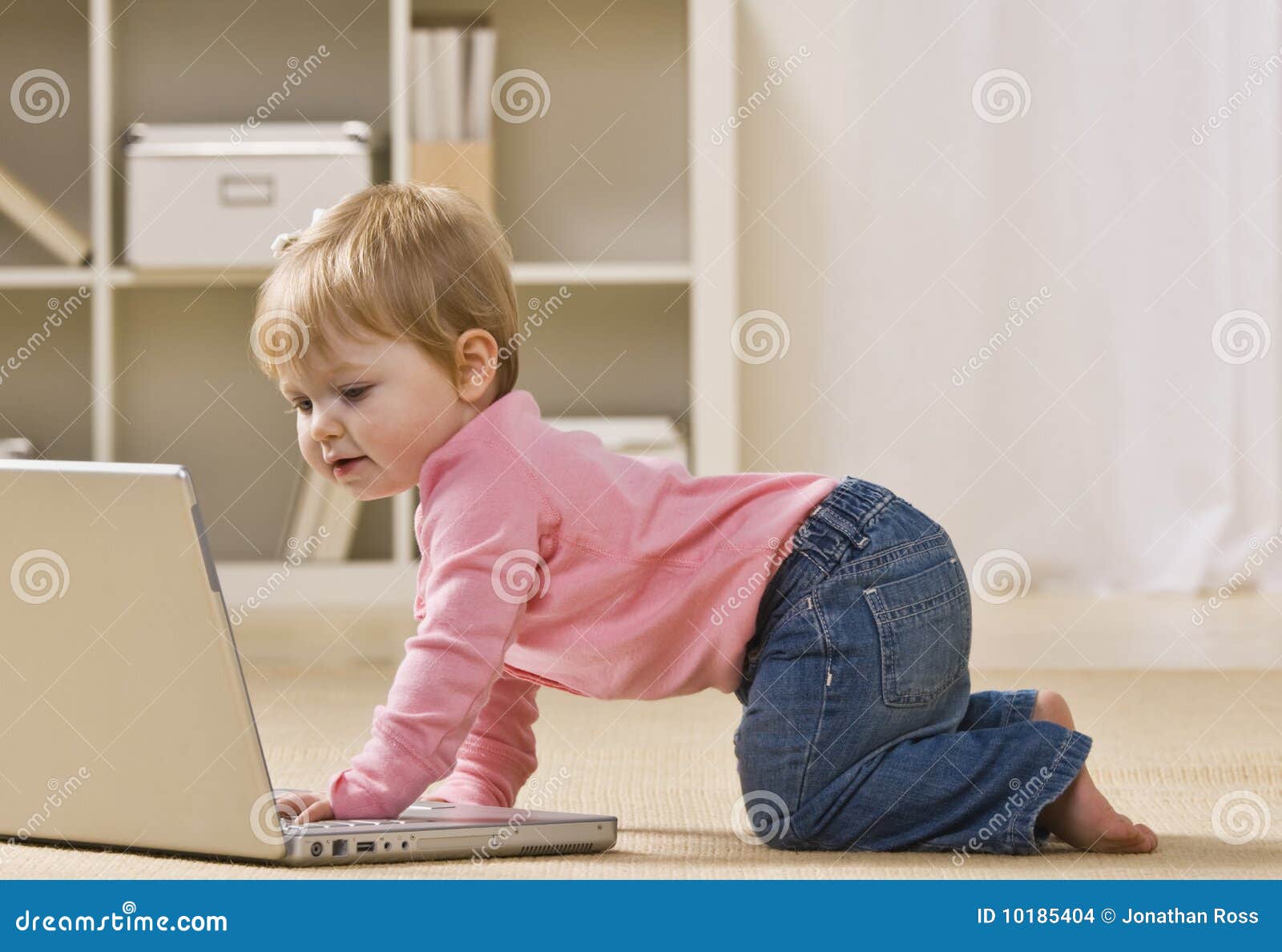 Baby Looking at Laptop stock photo. Image of house, girl - 10185404