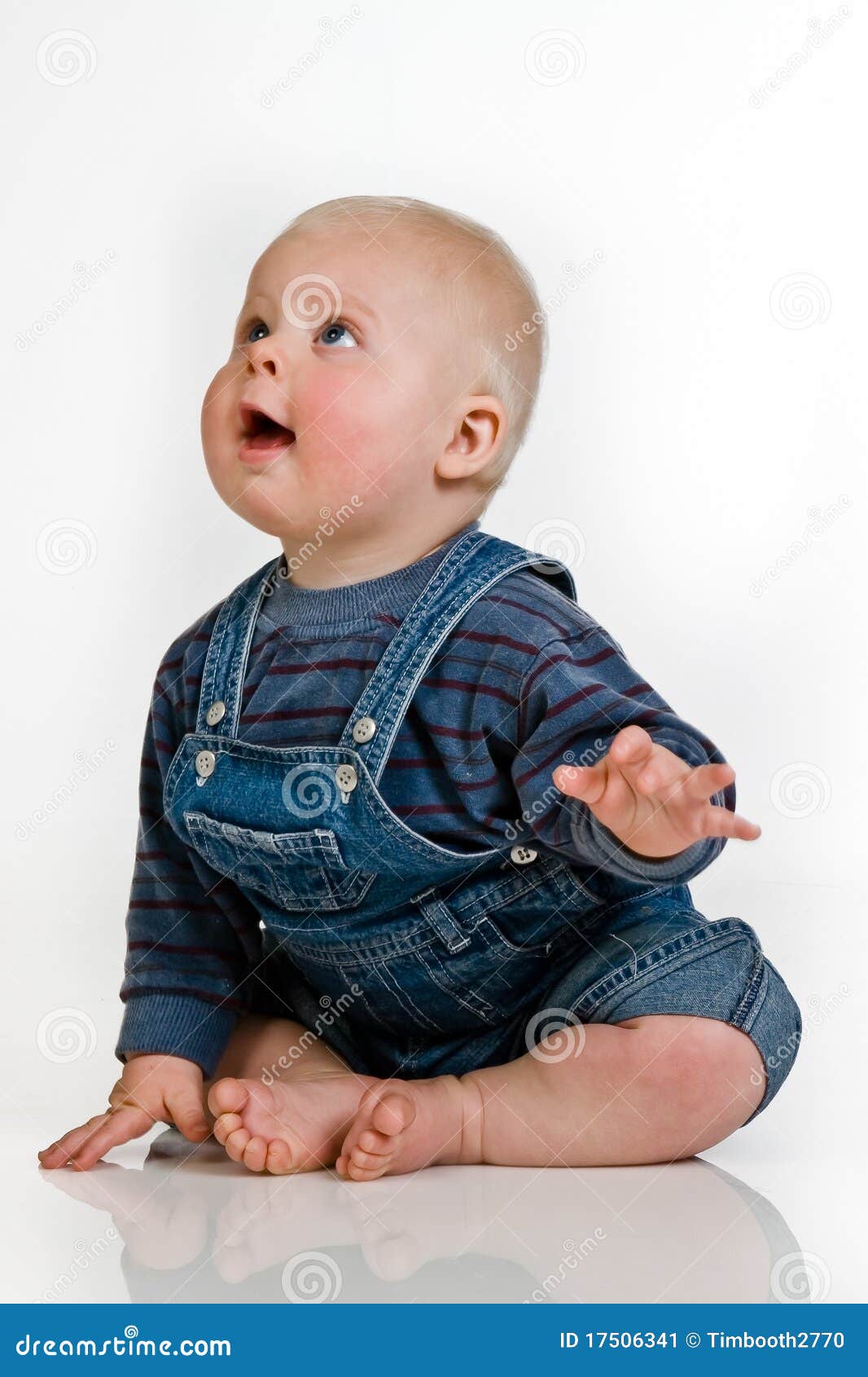 Baby Looking Left in Studio Stock Image - Image of studio, dungerees ...