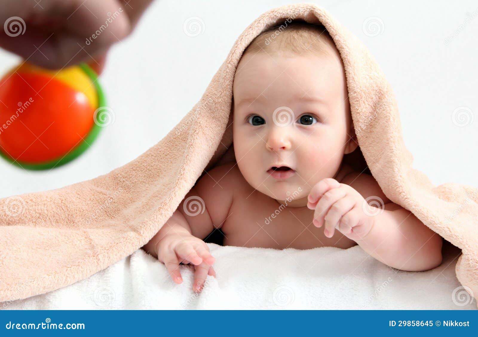 Baby looking at toy stock image. Image of happiness, born - 29858645